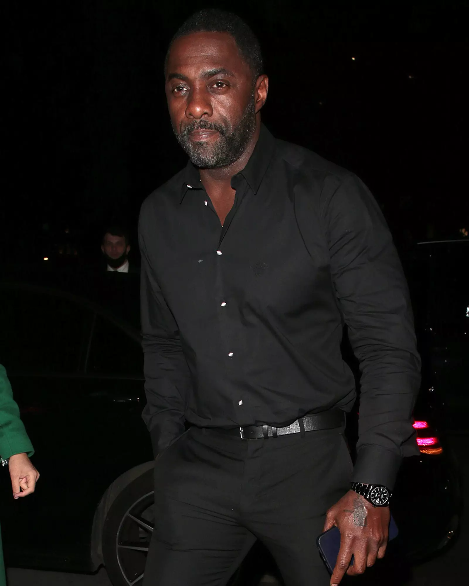 Idris Elba dressed in black