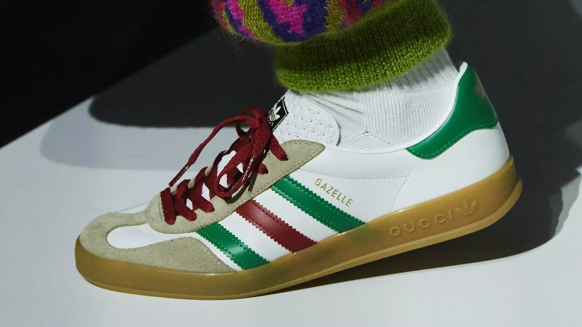 The adidas Gazelle by Gucci in the fall winter 2022 2023 collection of the Milanese firm.