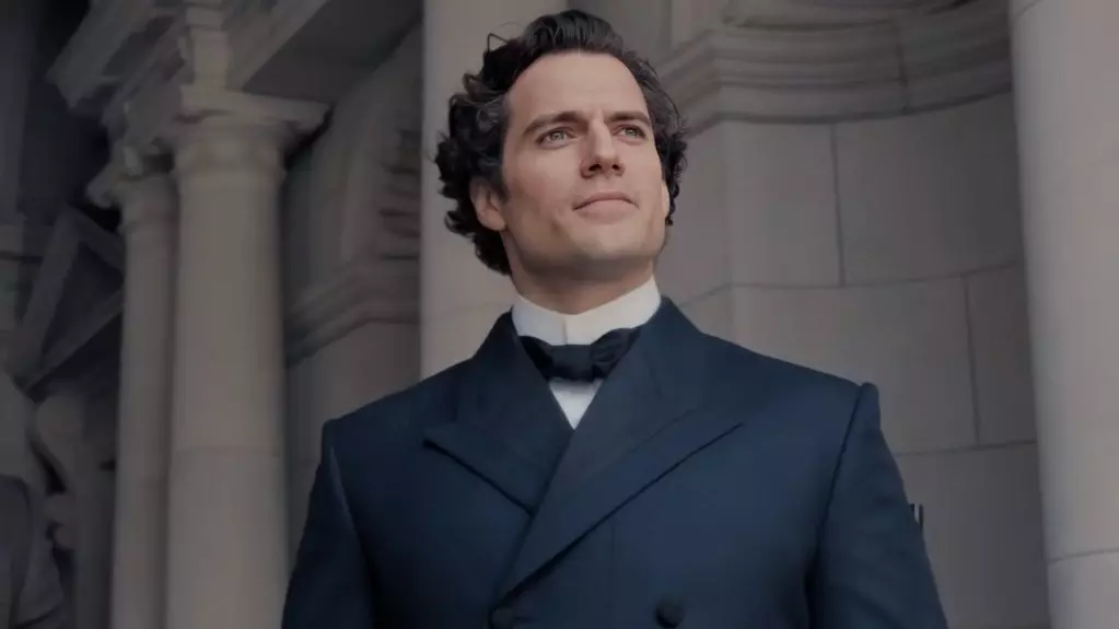 Jak je Henry Cavill v Enola Holmes tak hezký, proč se nám tak líbí jeho obleky a triky Sherlocka Holmese...