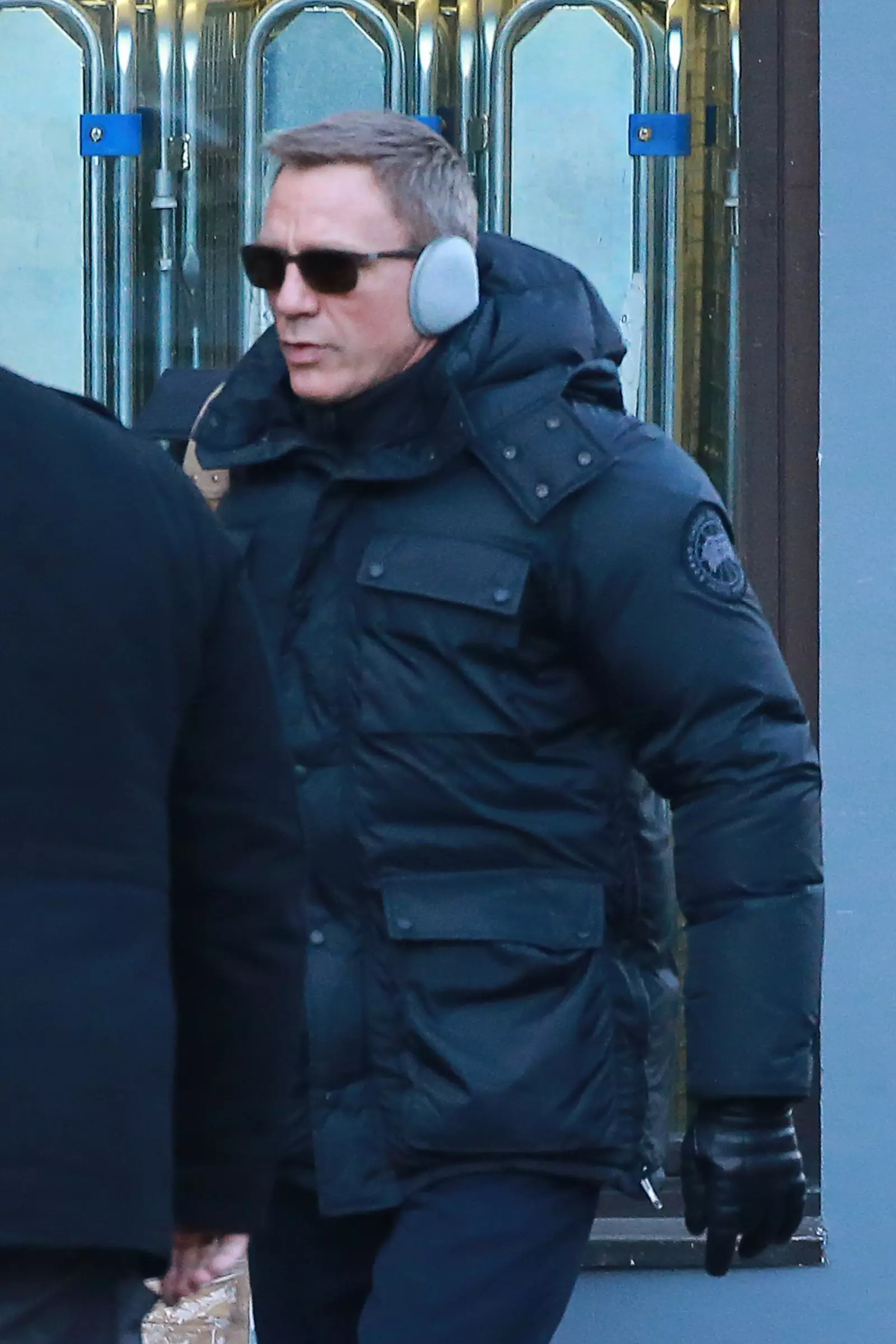 Daniel Craig on the set of Specter in a Canada Goose down parka.